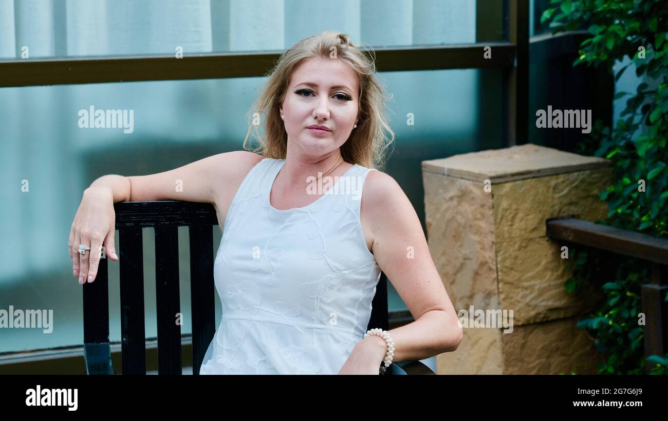 Eastern European Caucasian woman middle aged blonde hair light skin ...