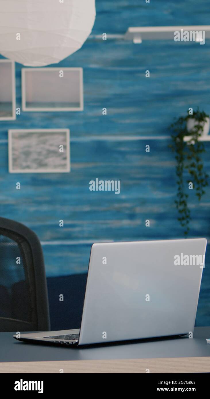Empty home office with computer in a beautiful, spacious living room ...