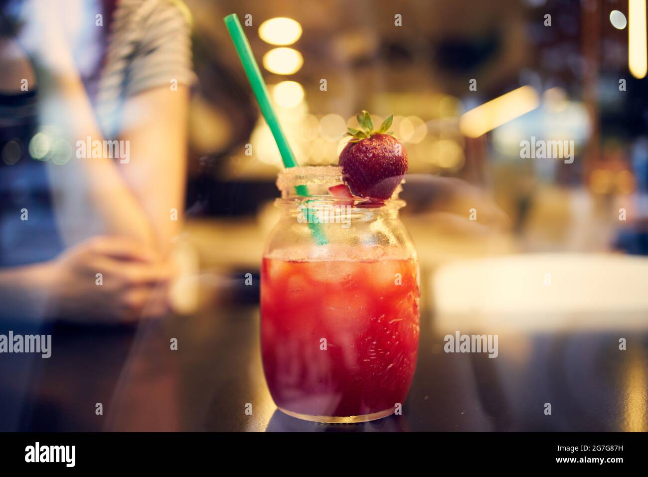 Drinking cocktail through straw hi-res stock photography and images - Alamy