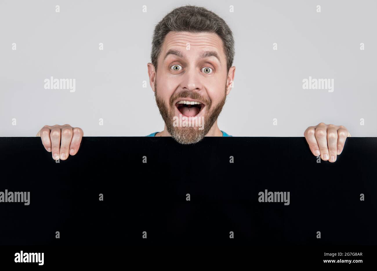 surprised man with copy space for advertisement. guy advertising ...