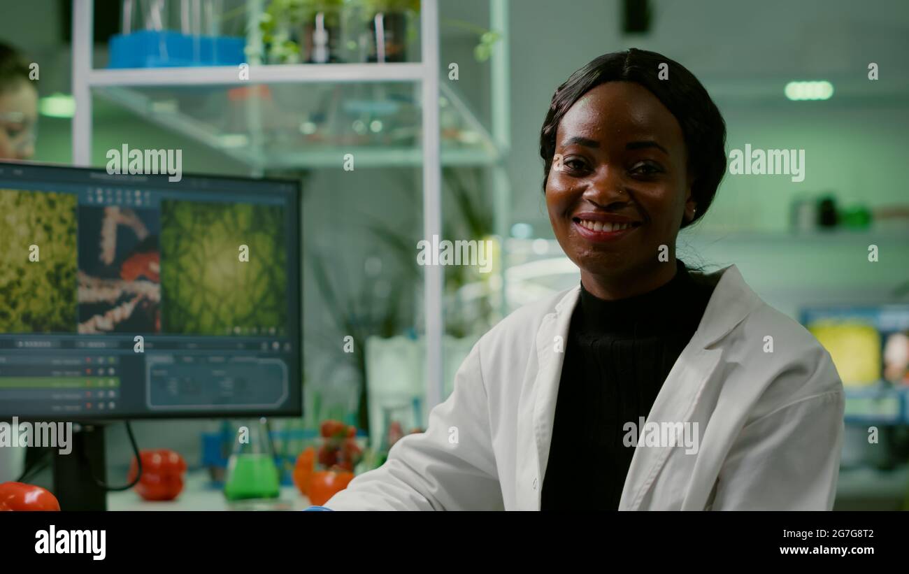 Woman standing looking dna hi-res stock photography and images - Alamy