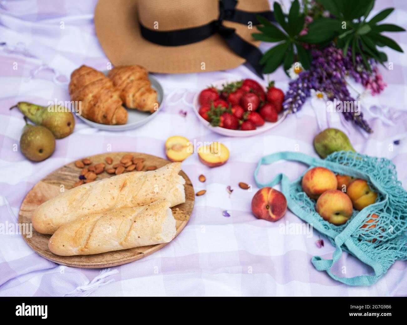 Romantic picnic scene on summer day. Outdoor picnic with wine and a ...