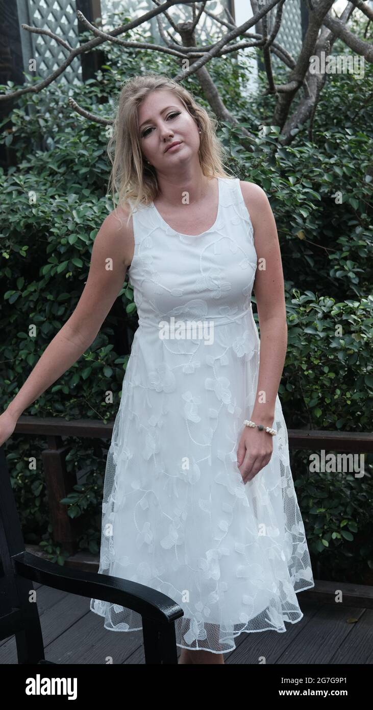 Eastern European Caucasian woman middle aged blonde hair light skin ...