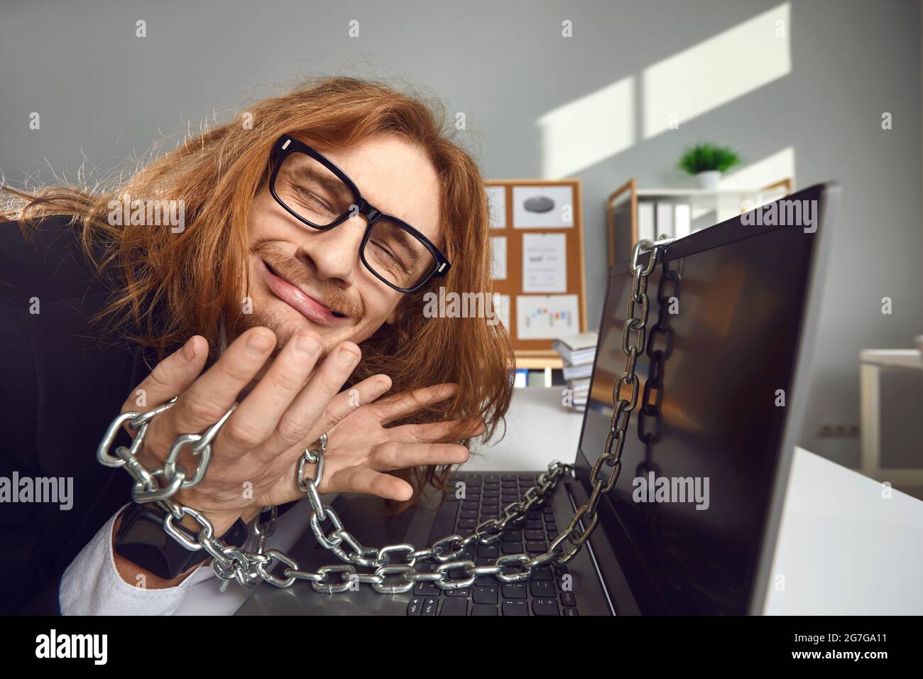 Man chained office hi-res stock photography and images - Alamy