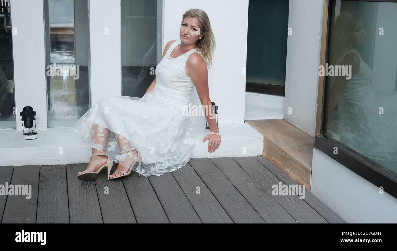 Eastern European Caucasian woman middle aged blonde hair light skin ...