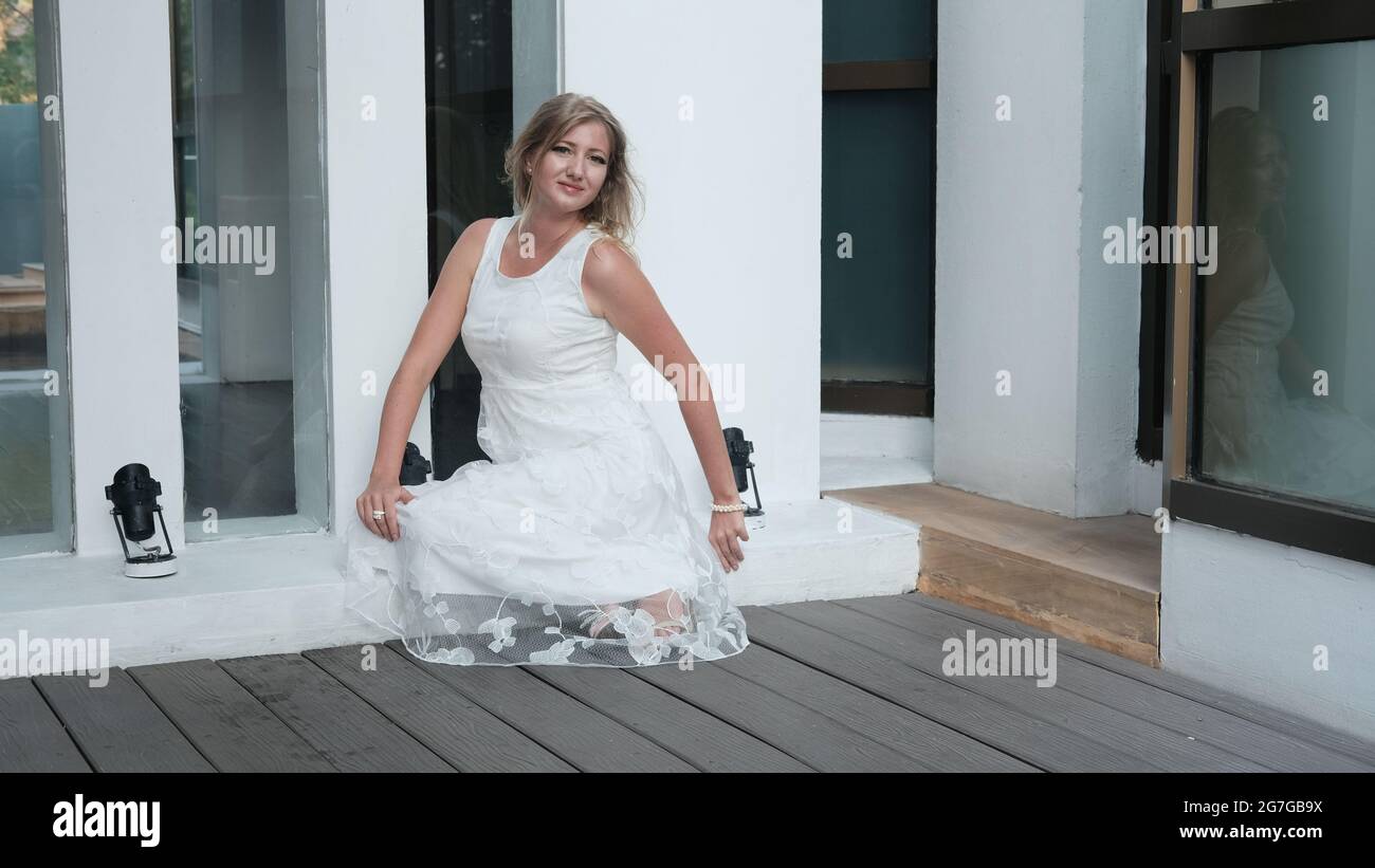 Eastern European Caucasian woman middle aged blonde hair light skin ...