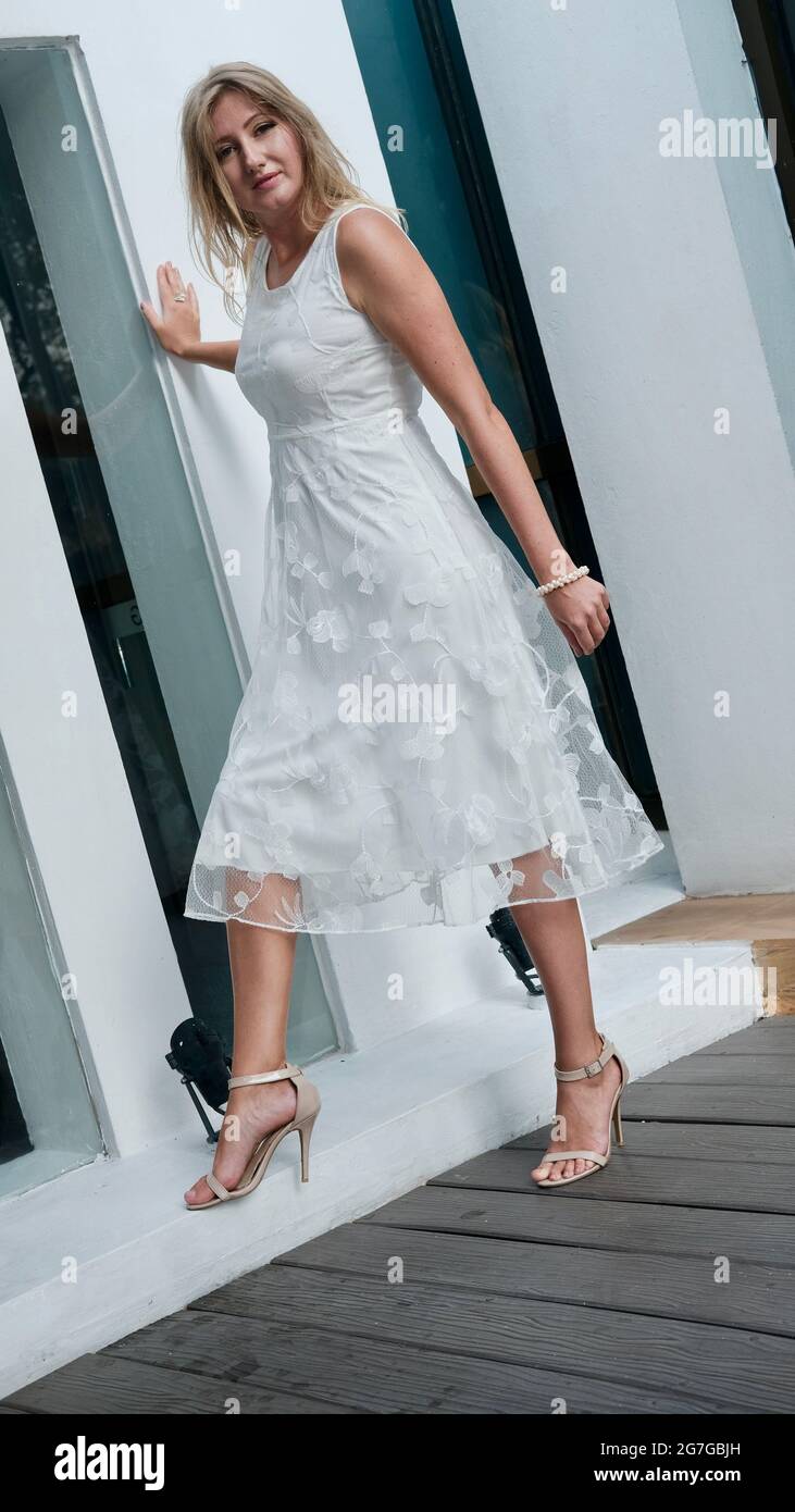 Eastern European Caucasian woman middle aged blonde hair light skin ...