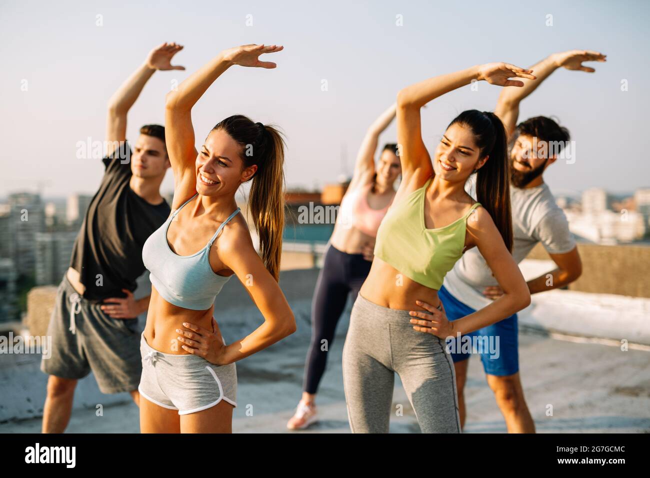 Fitness, sport, friendship and healthy lifestyle concept. Group of ...