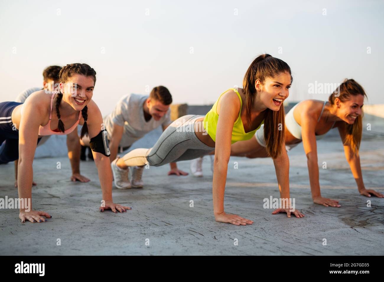 Fitness, sport, friendship and healthy lifestyle concept. Group of ...