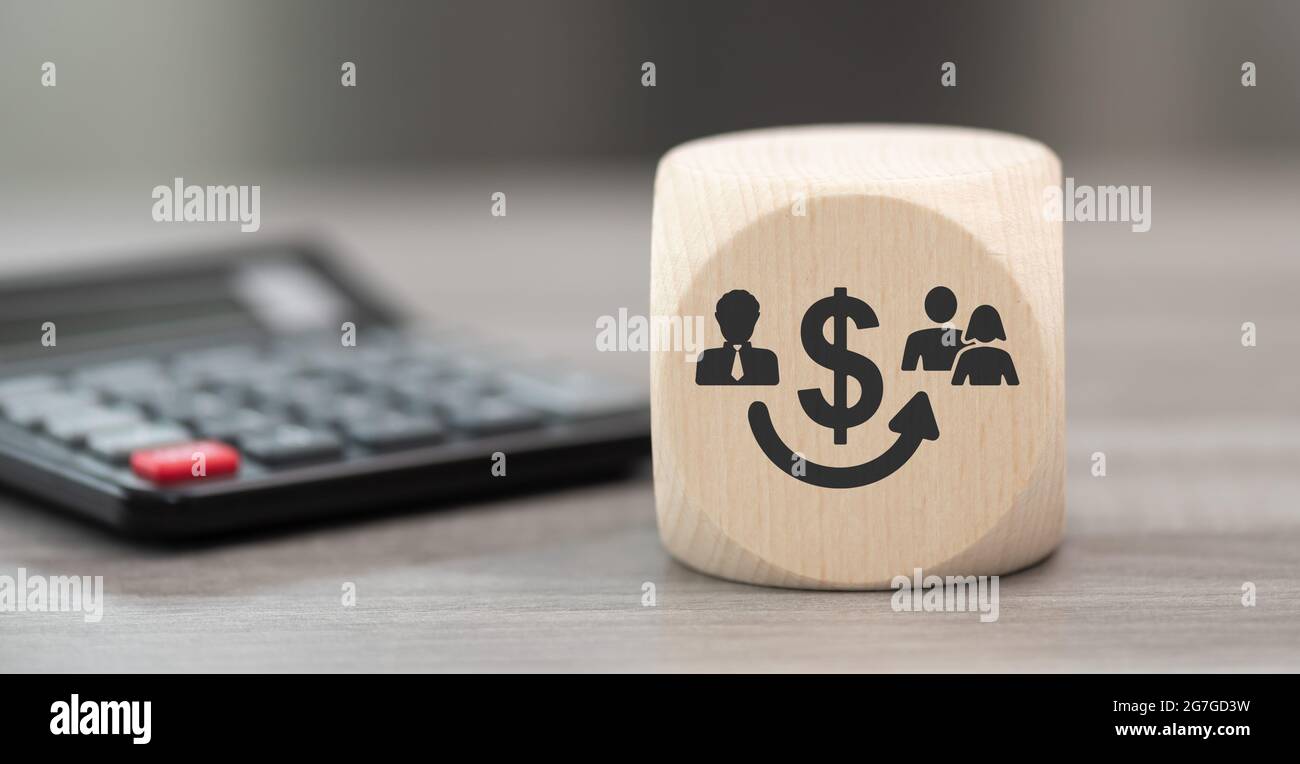 Wooden block with symbol of personal loan concept and calculator on ...