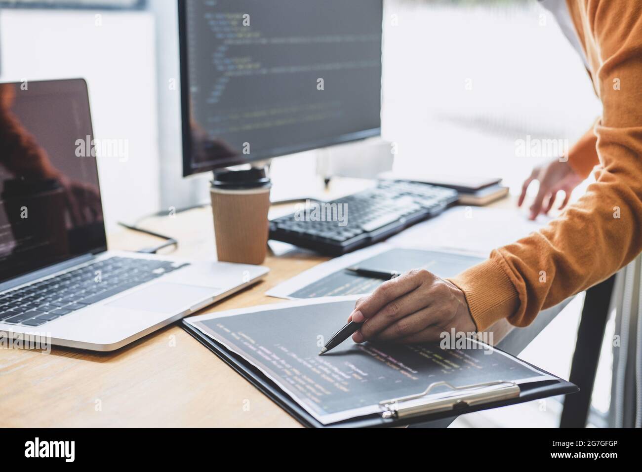 Young Professional programmer working at developing programming and ... Young Professional programmer working at developing programming and ...