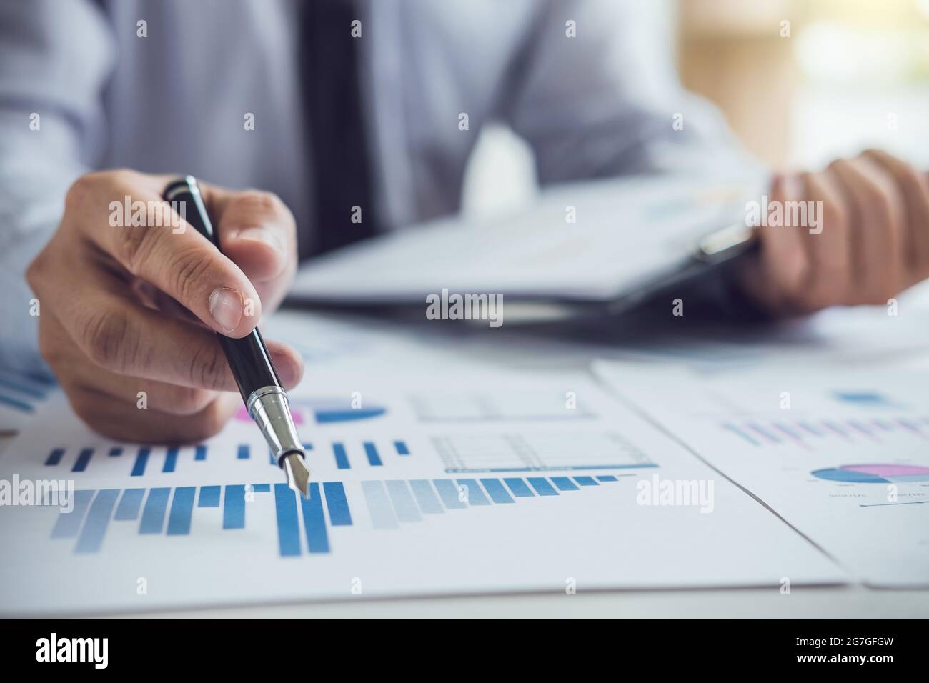 Business man or accountant working Financial investment on calculator ...