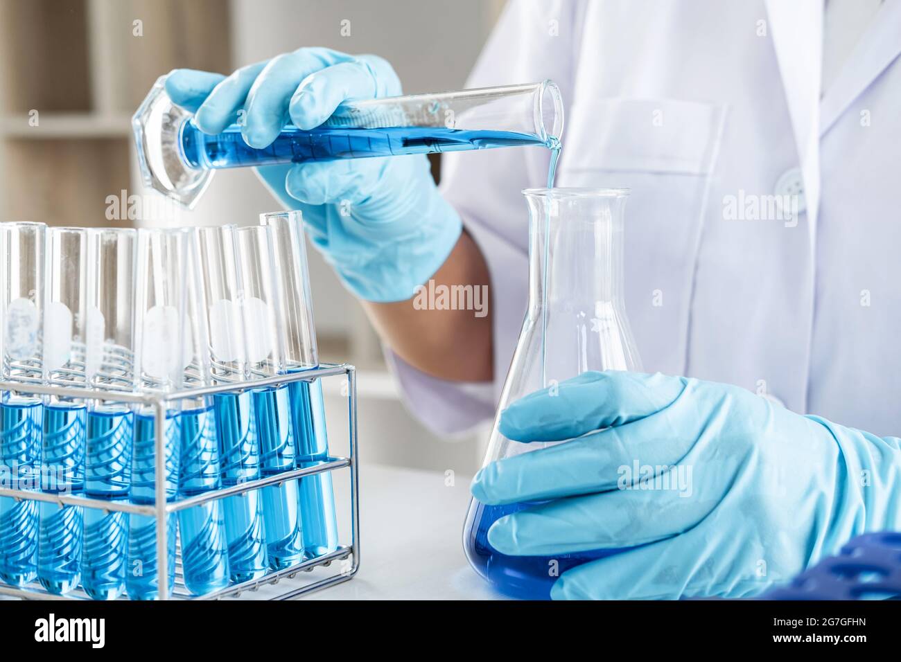 Biochemistry laboratory research, Scientist or medical in lab coat ...