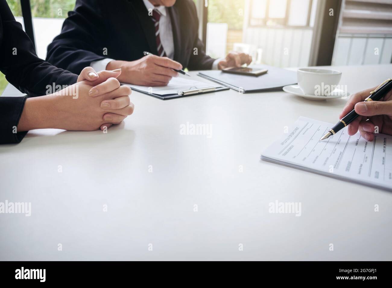 Interviewer or Board reading a resume during a job interview, Employer ...