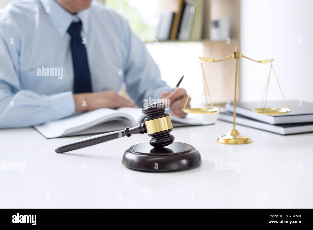 Judge gavel with scales of justice, male lawyers working having at law ...