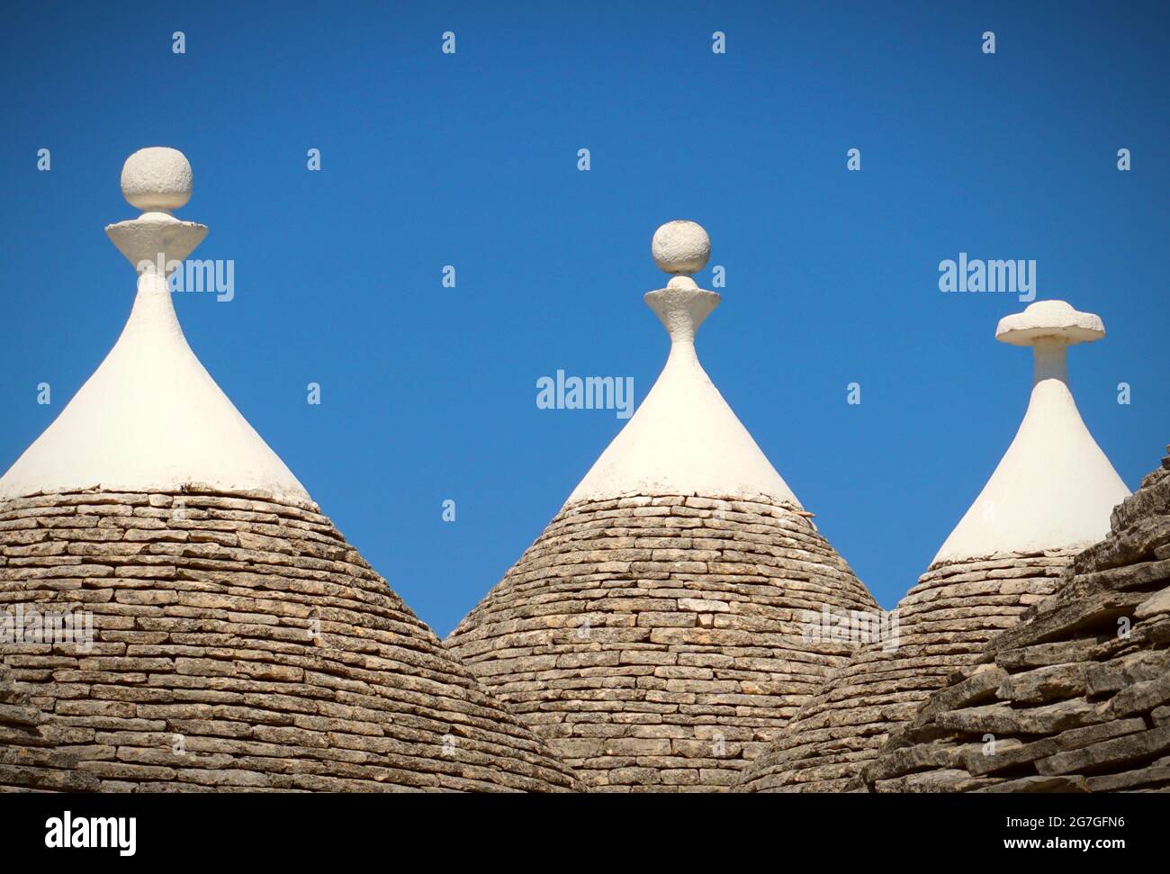 A trullo (plural, trulli) is a traditional Apulian dry stone hut with a ...
