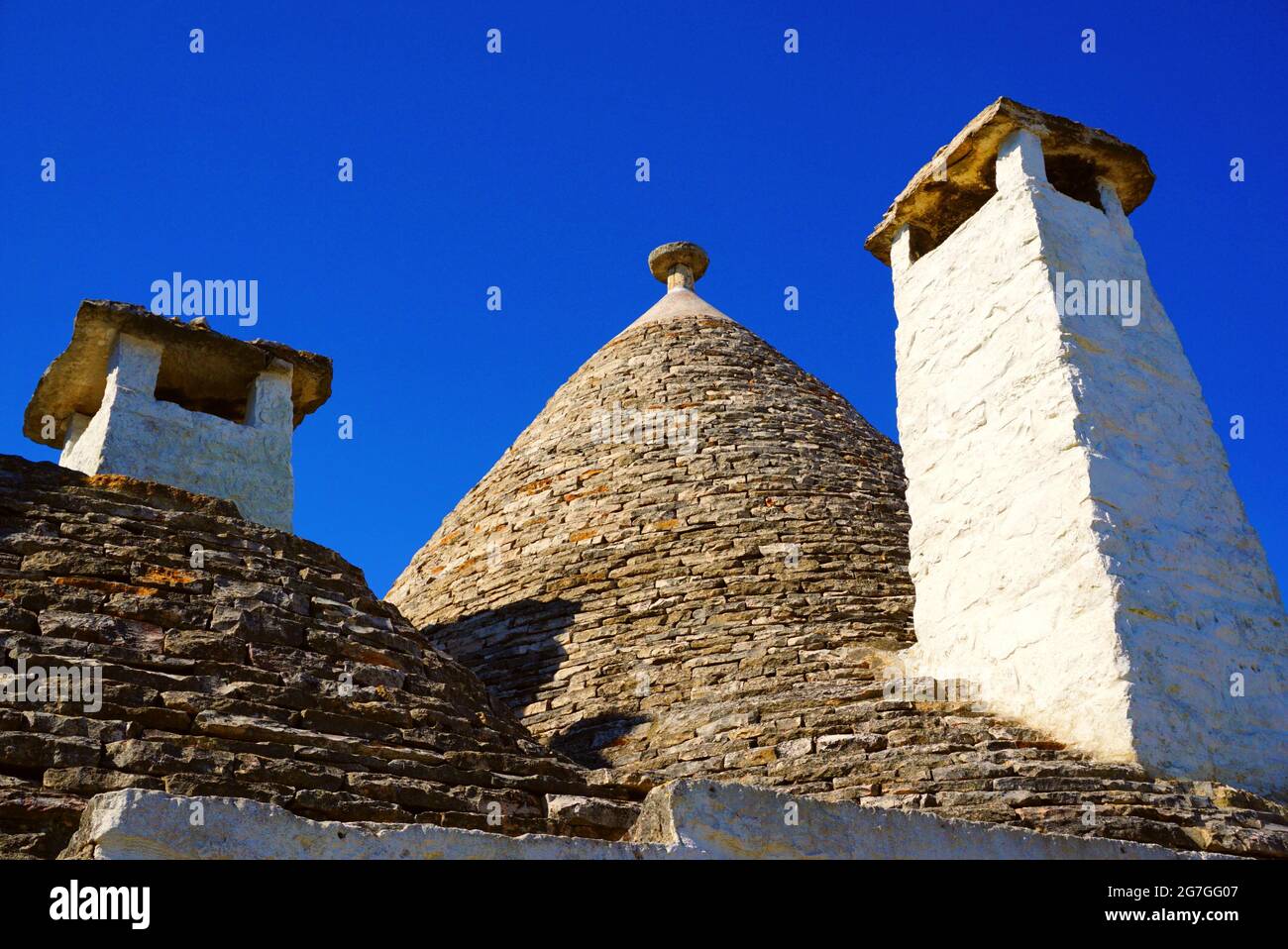 A trullo (plural, trulli) is a traditional Apulian dry stone hut with a ...