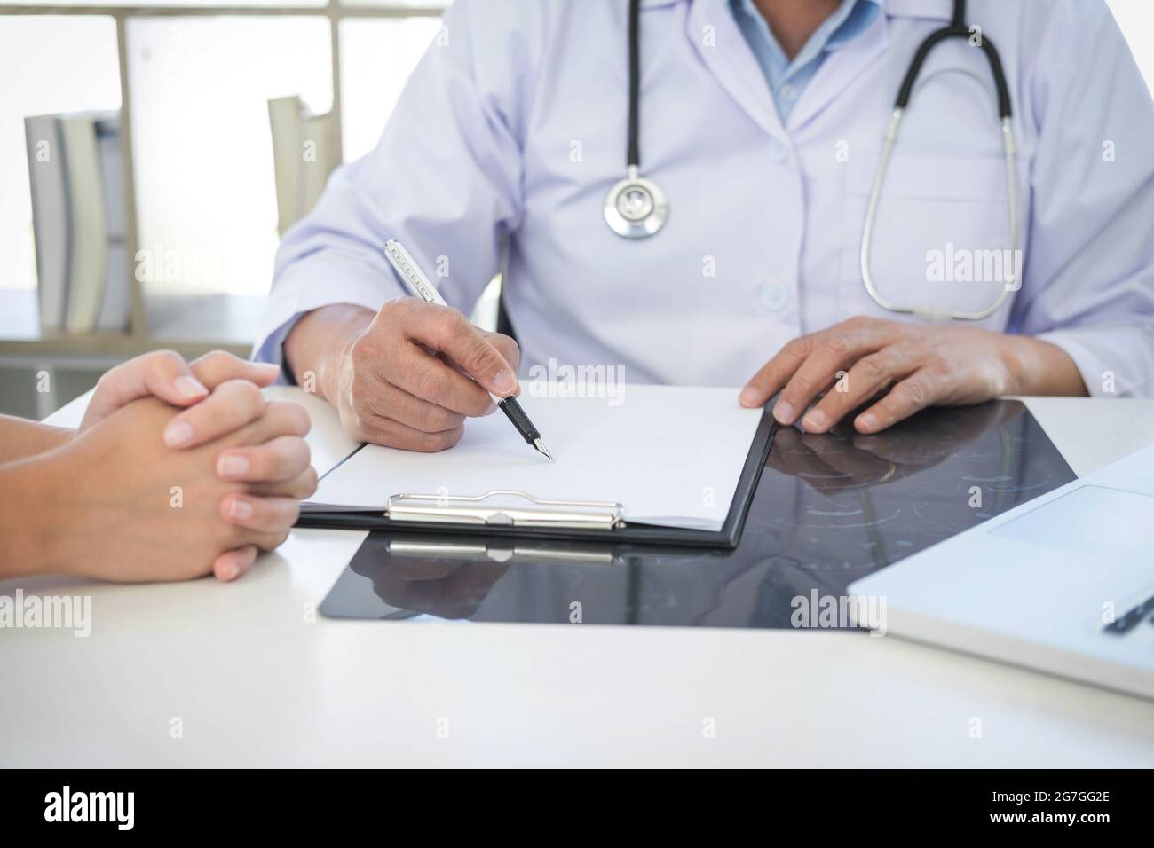 Professor Doctor report and recommend a method with patient treatment ...