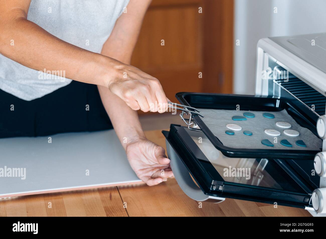 Artisan Person Using Oven Stock Photo - Alamy
