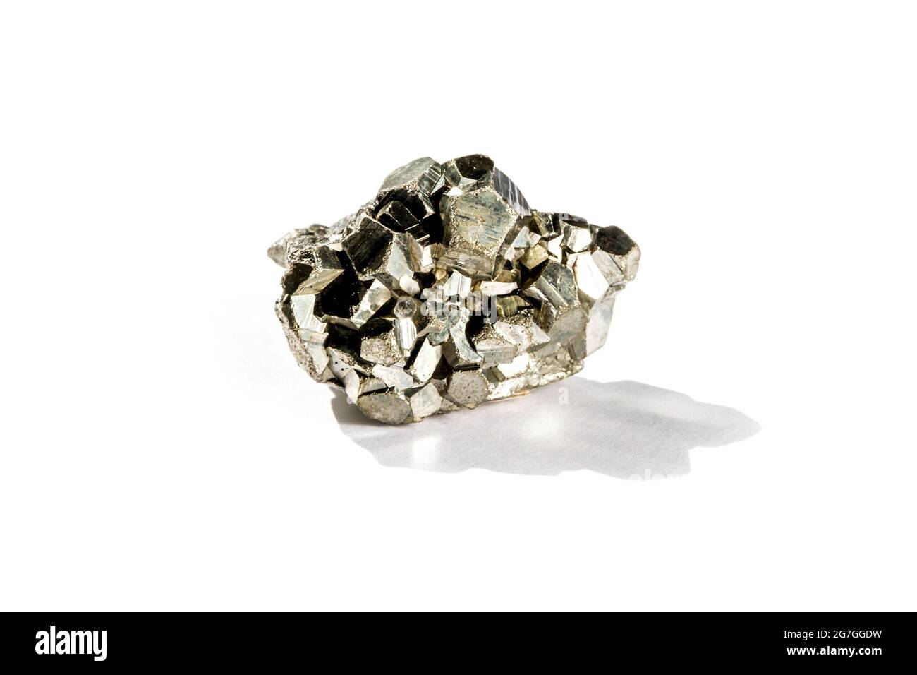 Pyrite gemstone isolated on a white background Stock Photo - Alamy