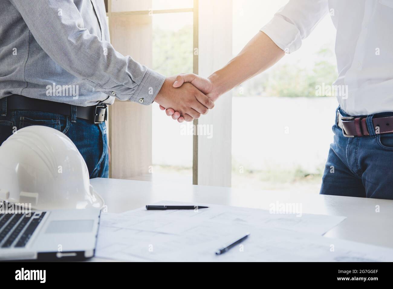 Two engineer or architect meeting for project, handshake after ...