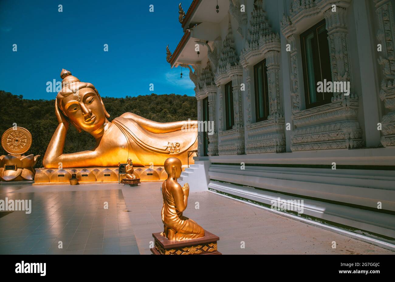 Wat Khao Sung Chaem Fa temple with giant snake and reclining gold ...