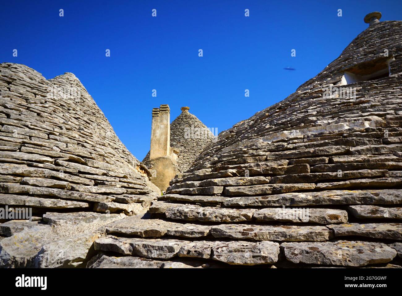 A trullo (plural, trulli) is a traditional Apulian dry stone hut with a ...