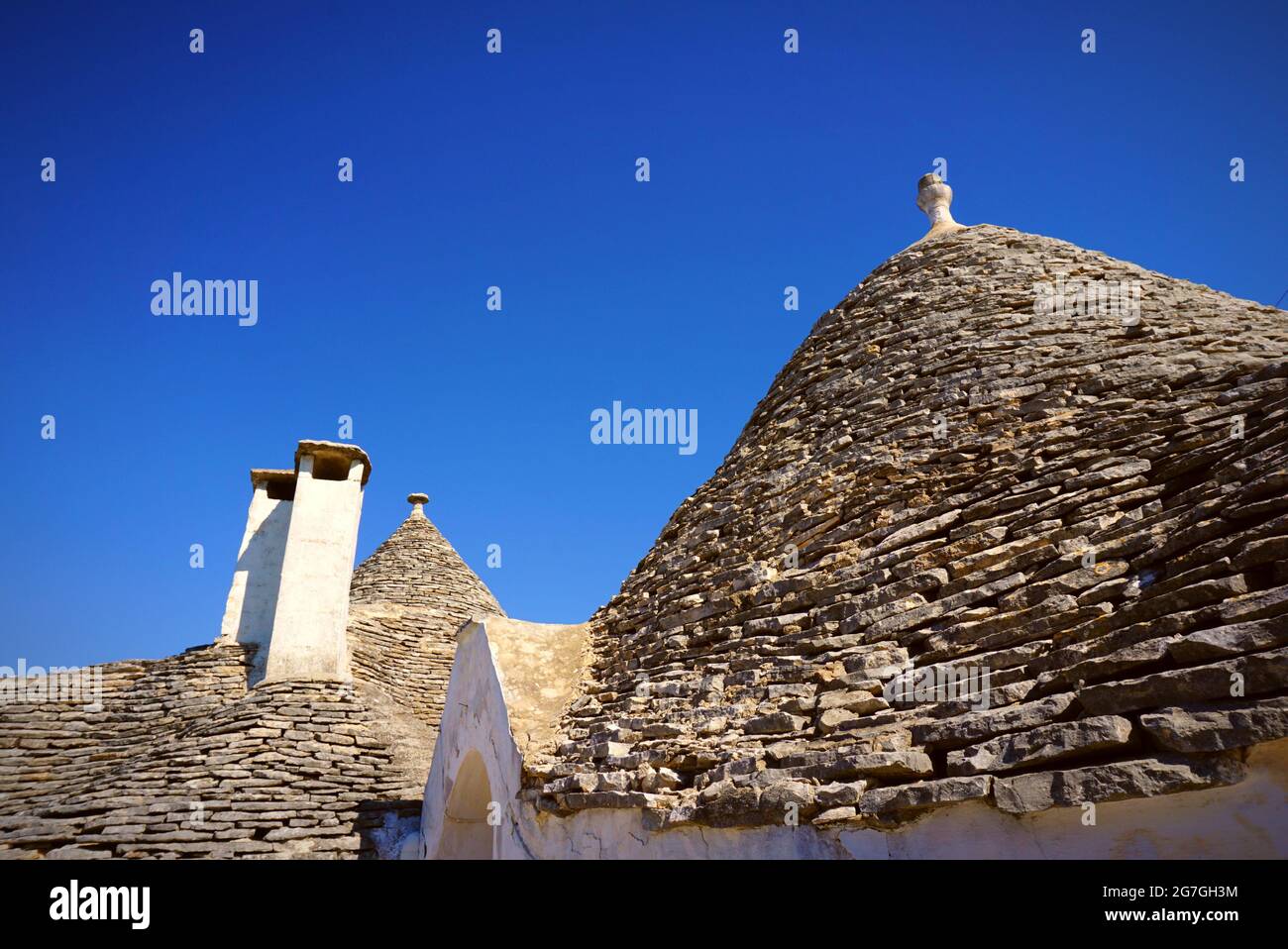 A trullo (plural, trulli) is a traditional Apulian dry stone hut with a ...