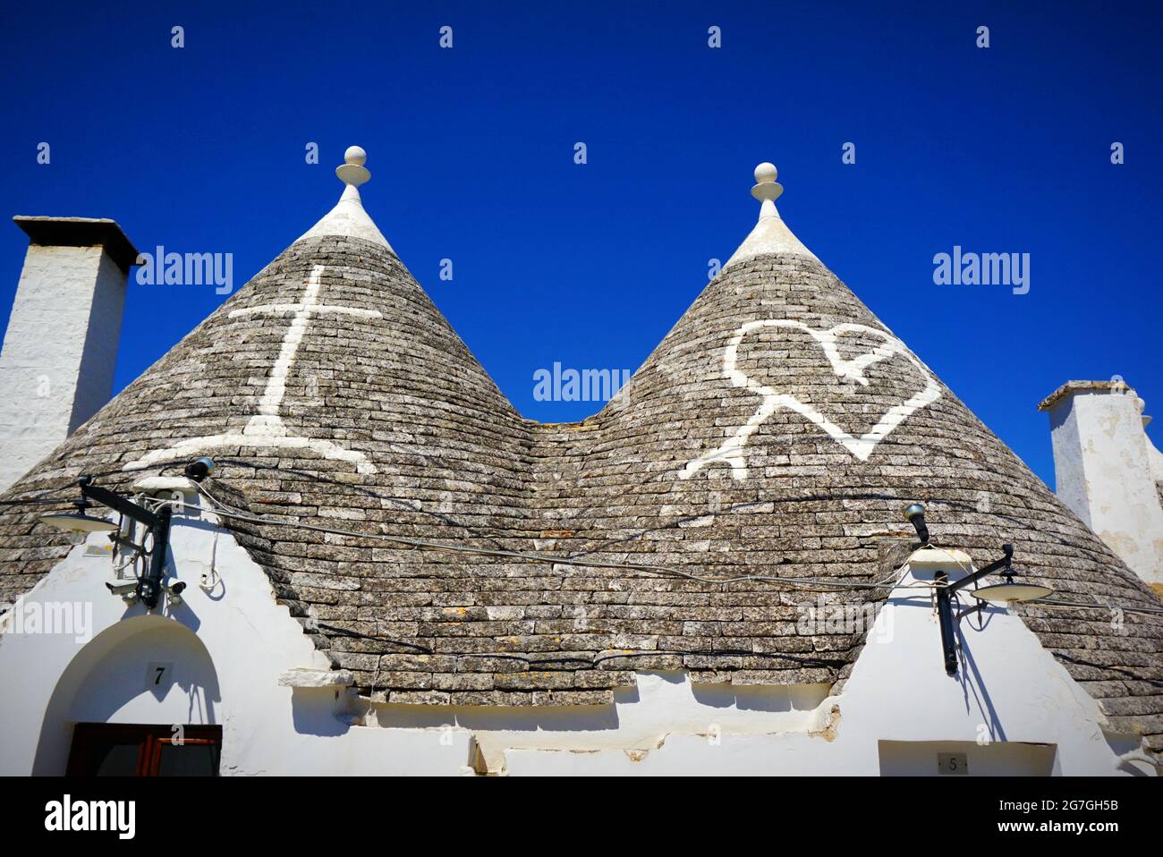A trullo (plural, trulli) is a traditional Apulian dry stone hut with a ...