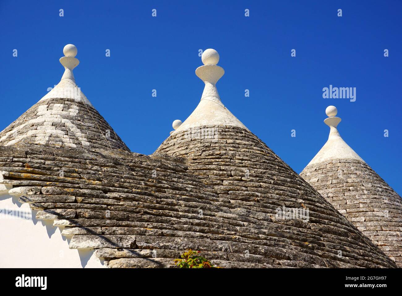 A trullo (plural, trulli) is a traditional Apulian dry stone hut with a ...