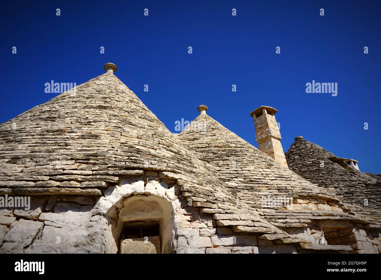 A trullo (plural, trulli) is a traditional Apulian dry stone hut with a ...
