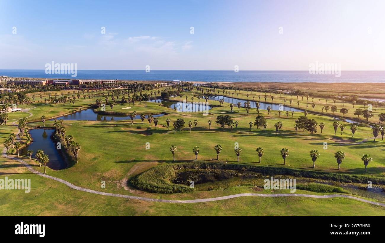 Green golf courses by the sea. Salgados beach. Portugal, Albufeira ...