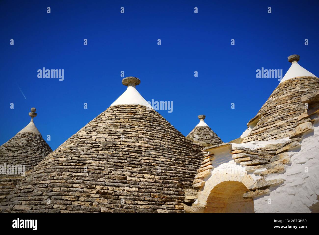 A trullo (plural, trulli) is a traditional Apulian dry stone hut with a ...