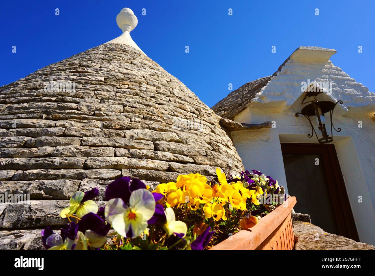A trullo (plural, trulli) is a traditional Apulian dry stone hut with a ...