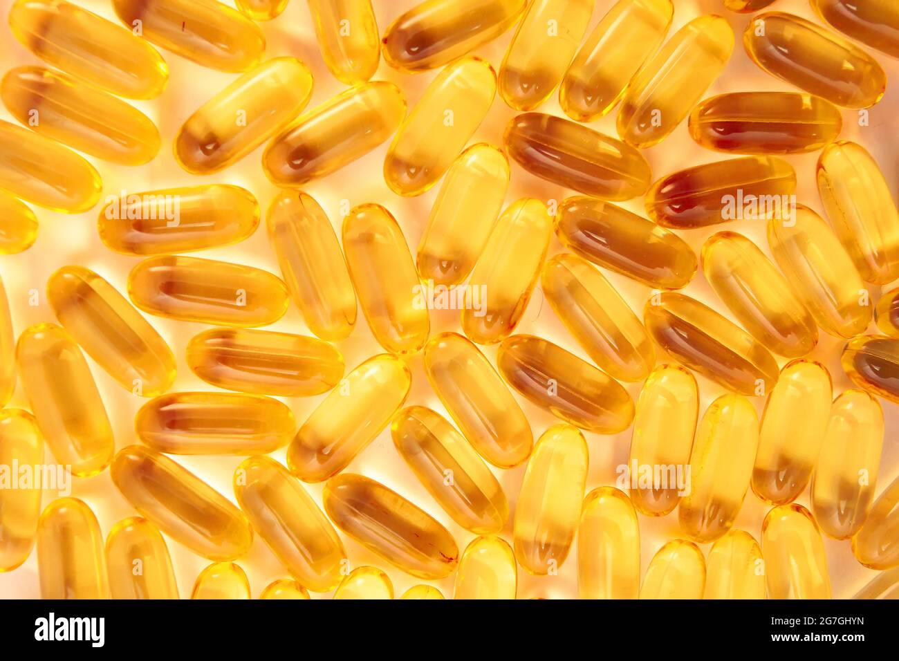 fish oil omega 3 on white background texture Stock Photo - Alamy