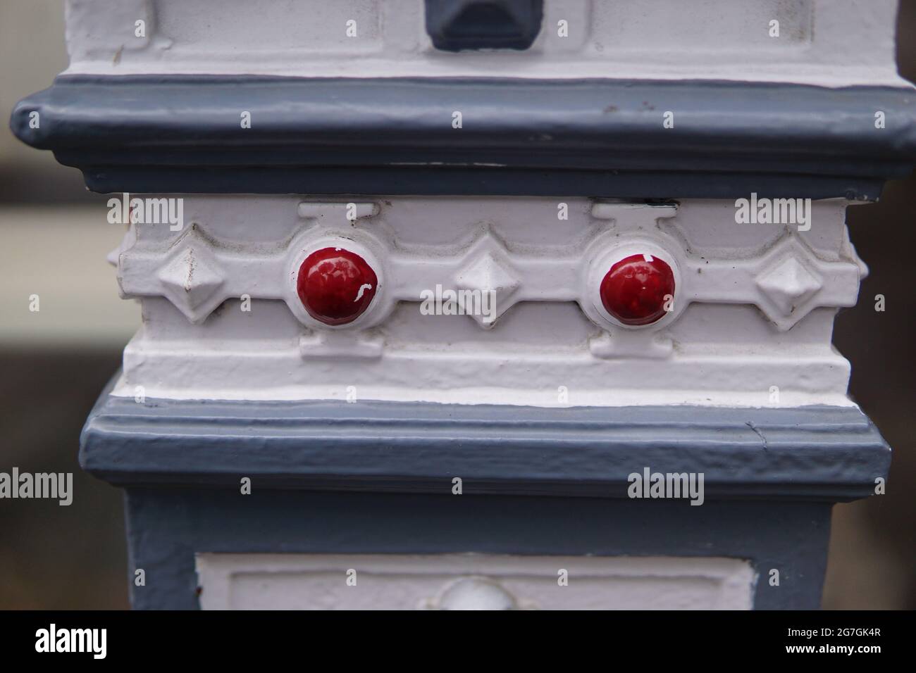 Closeup shot of a heavily detailed white and gray pillar with intricate ...