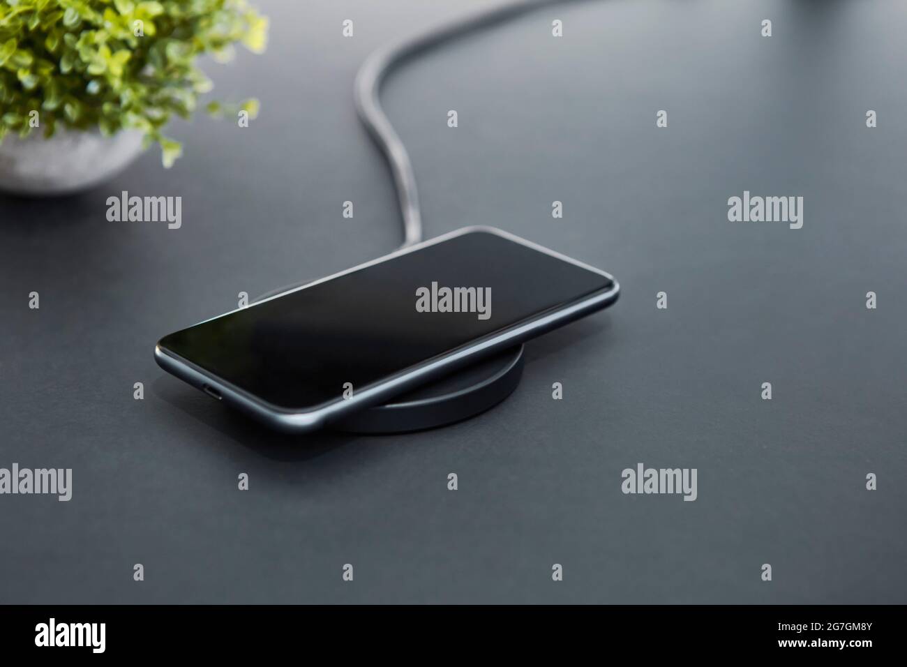 Induction wireless charging of smartphone battery during workday in ...