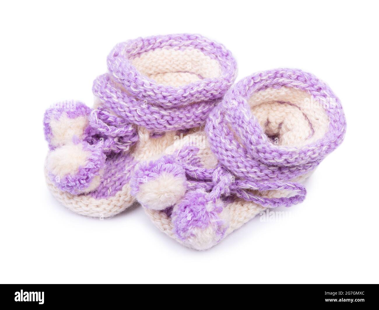Pair of baby bootees isolated on white background Stock Photo - Alamy