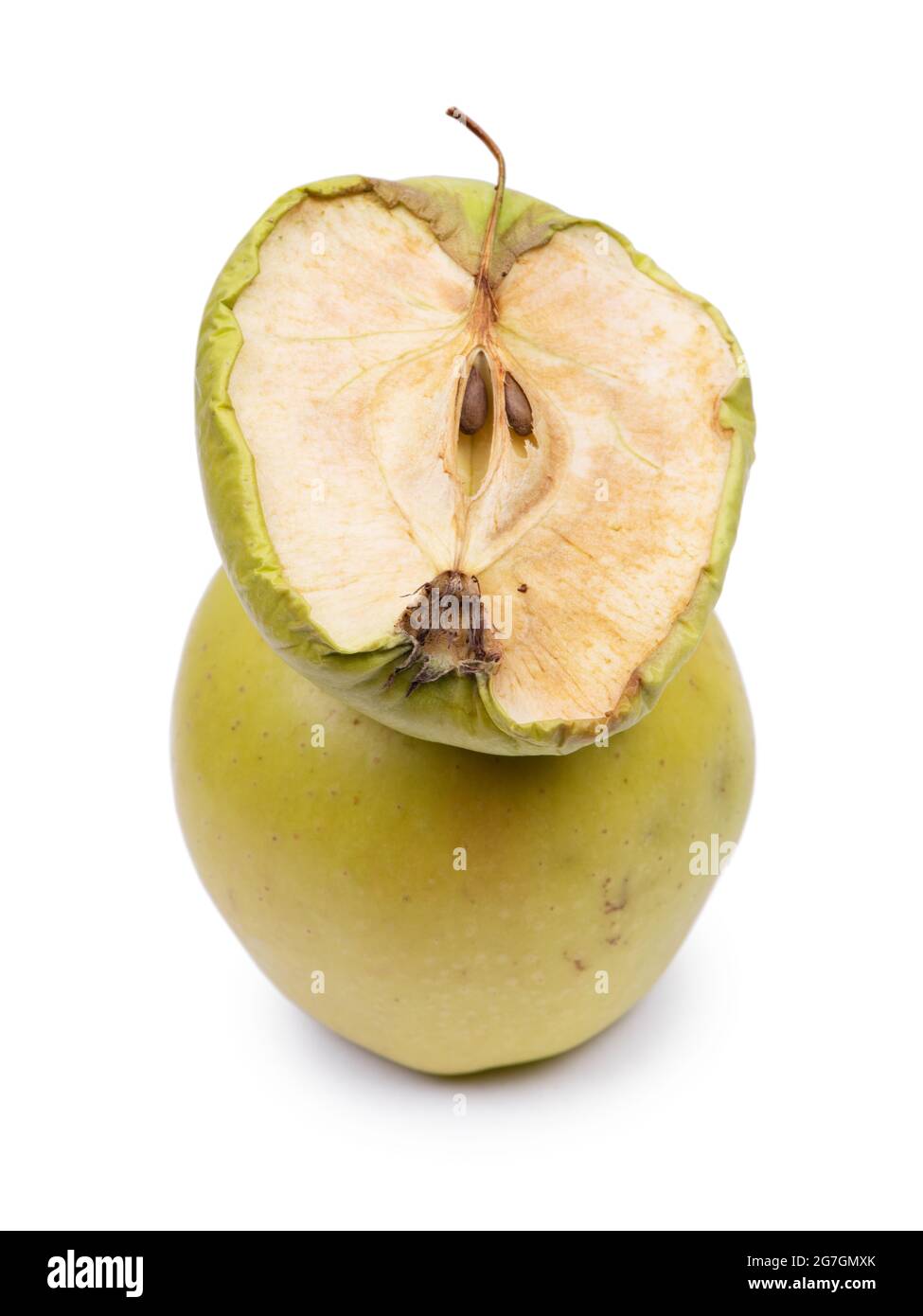 Piece of withering apple isolated on white background Stock Photo - Alamy