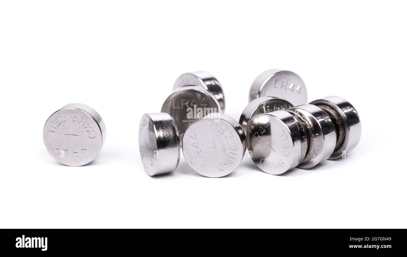 Group of button cell isolated on white background. Small watch lithium ...