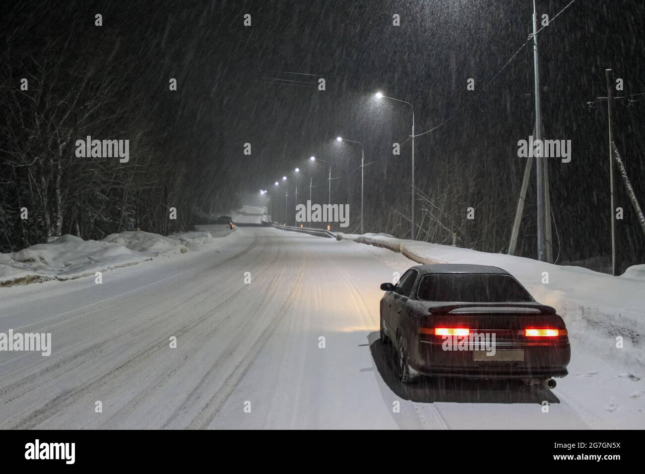 Concept winter road at night hi-res stock photography and images - Alamy