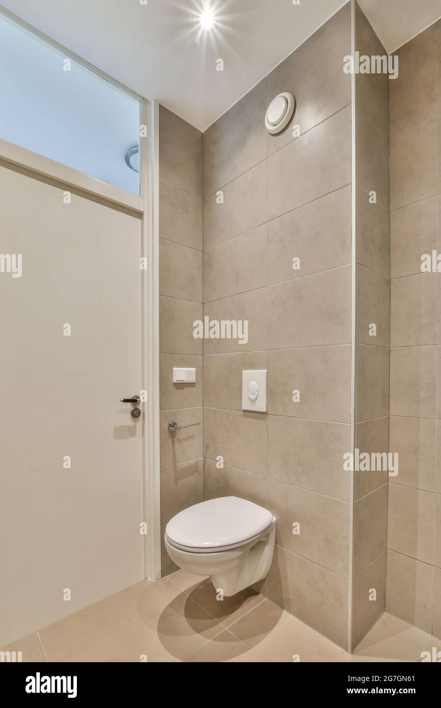 Interior of small clean washroom in miniature style Stock Photo - Alamy