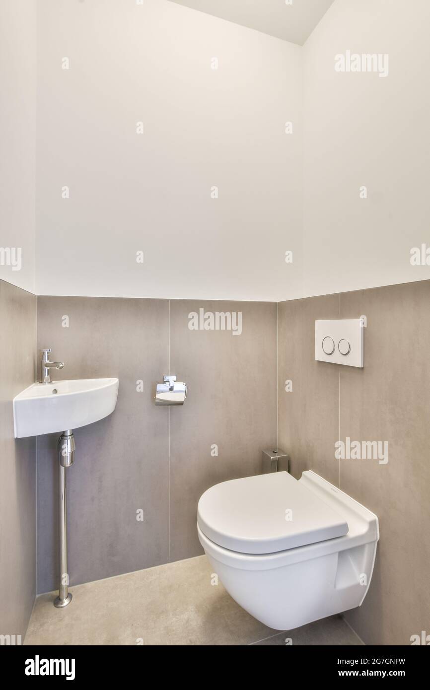Interior of small clean washroom in miniature style Stock Photo - Alamy