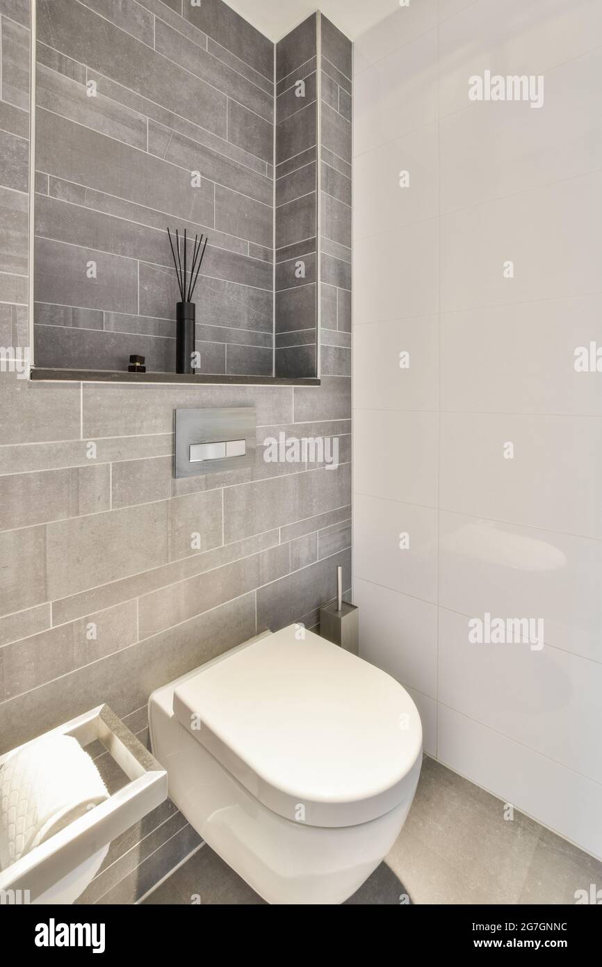 Interior of small clean washroom in miniature style Stock Photo - Alamy