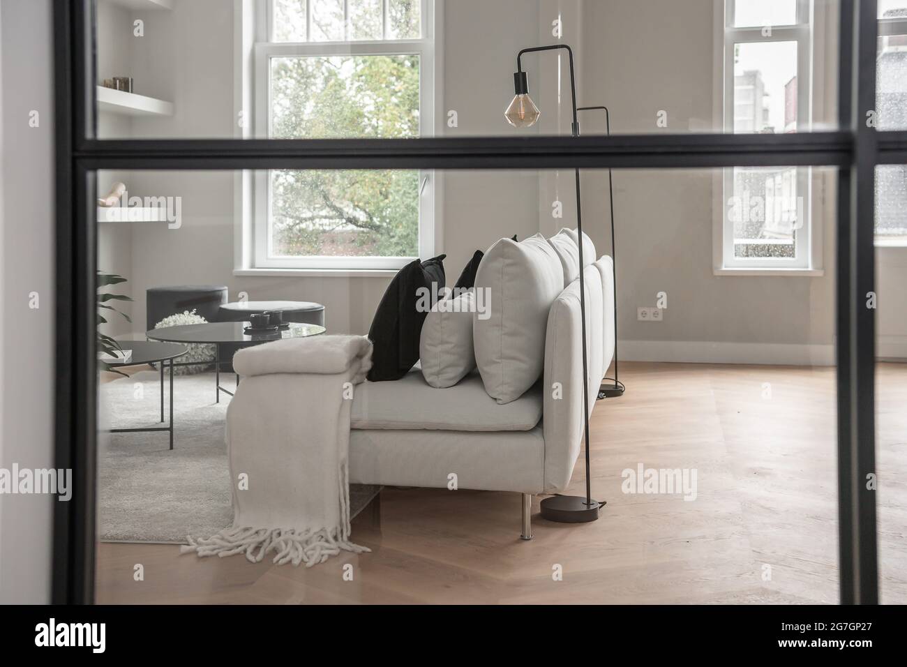 Side view of elegant sofa in the living room Stock Photo - Alamy