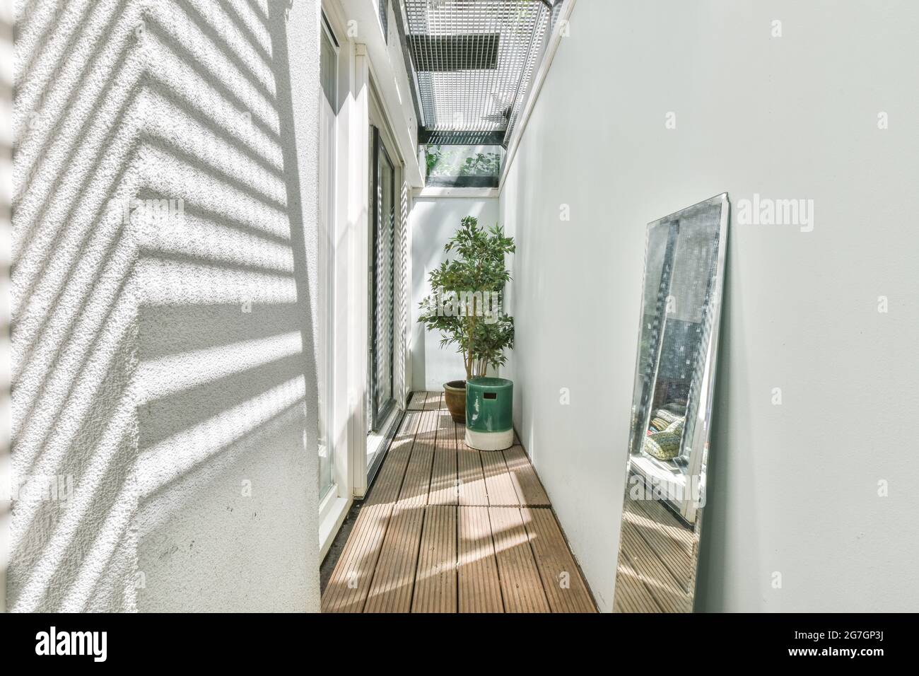 A long empty corridor designed in minimalistic style Stock Photo - Alamy