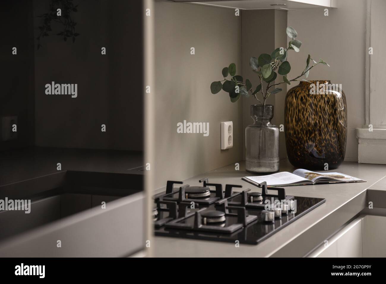 Beautiful and elegant gas stove in the kitchen Stock Photo - Alamy
