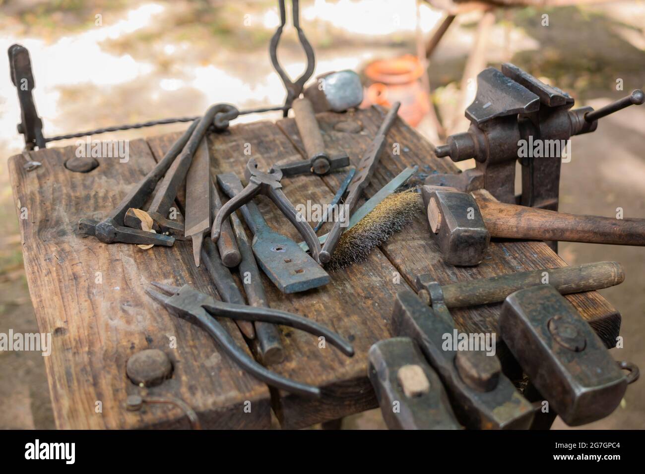 Blacksmith tools and instruments at outdoor forge, workshop - close up ...