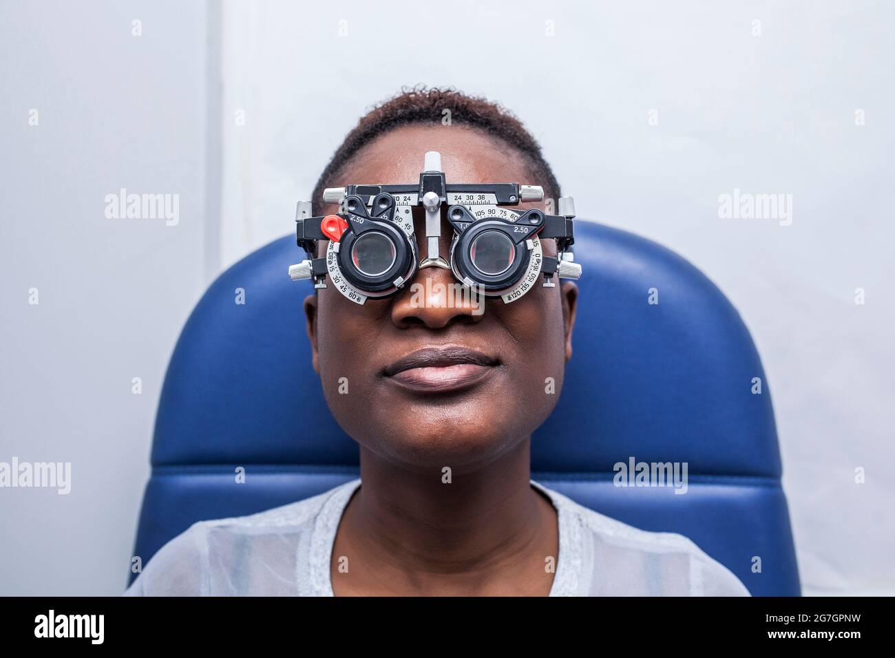 Black Woman in optometry cabinet during study of the eyesight Stock ...