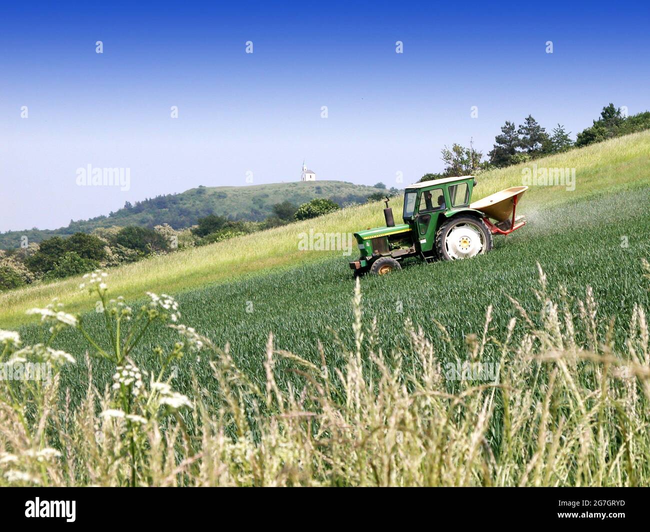 Farmer working a tractor hi-res stock photography and images - Alamy